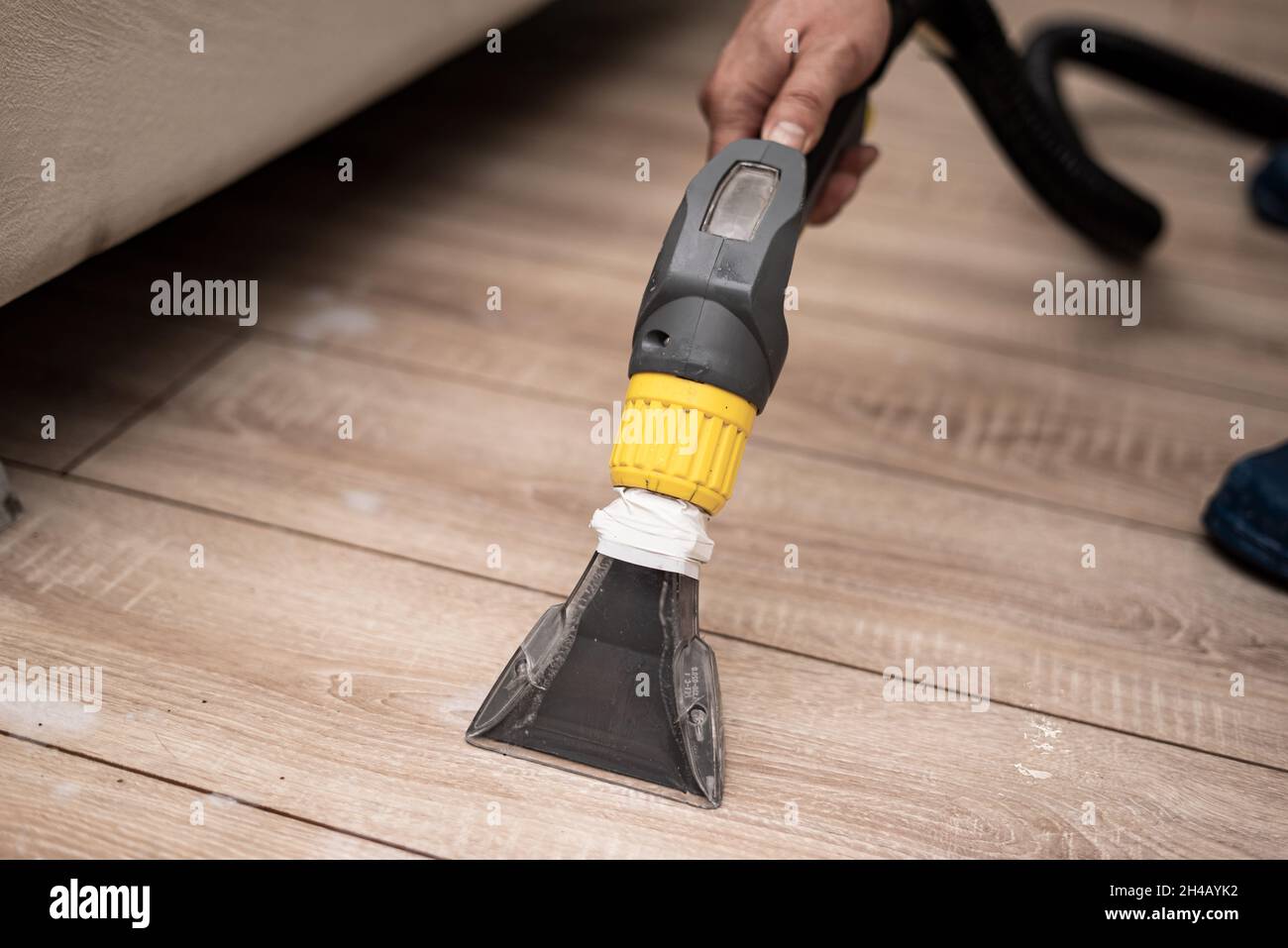 Professional cleaning furniture washing vacuum hi-res stock photography ...