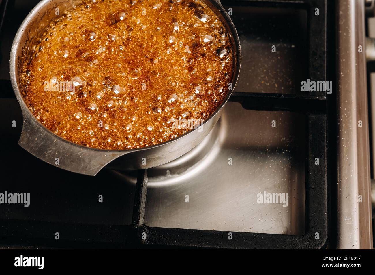 Preparation of sugar candies at home.A taste of our childhood.Rooster ...