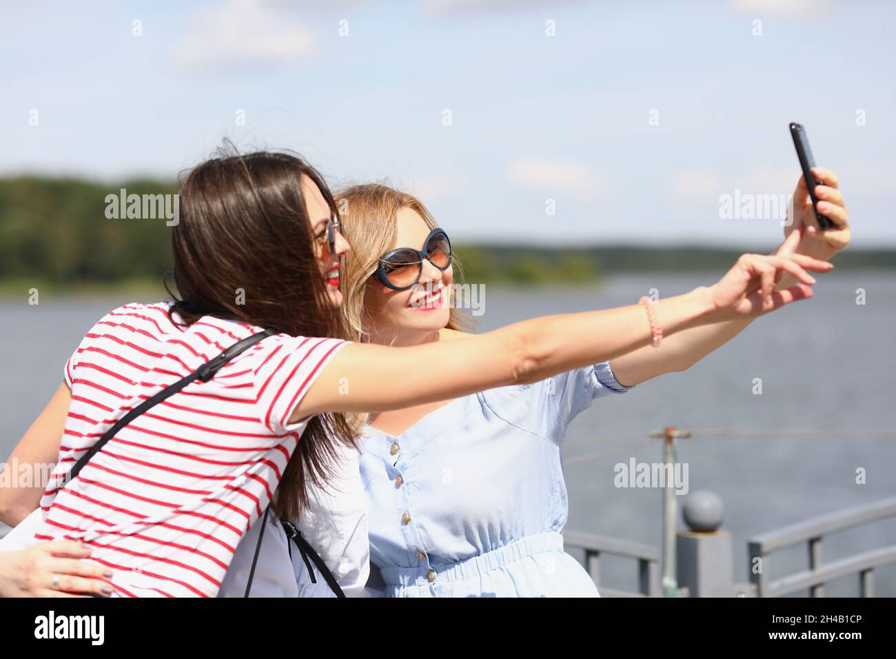 Attractive female take picture Stock Photo - Alamy