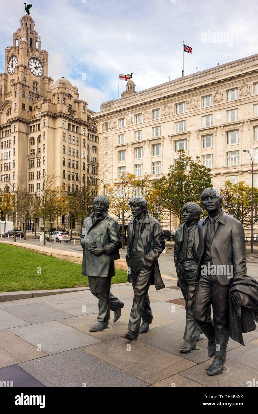 Bronze statues of the four Beatles created by sculptor Andy Edwards in ...