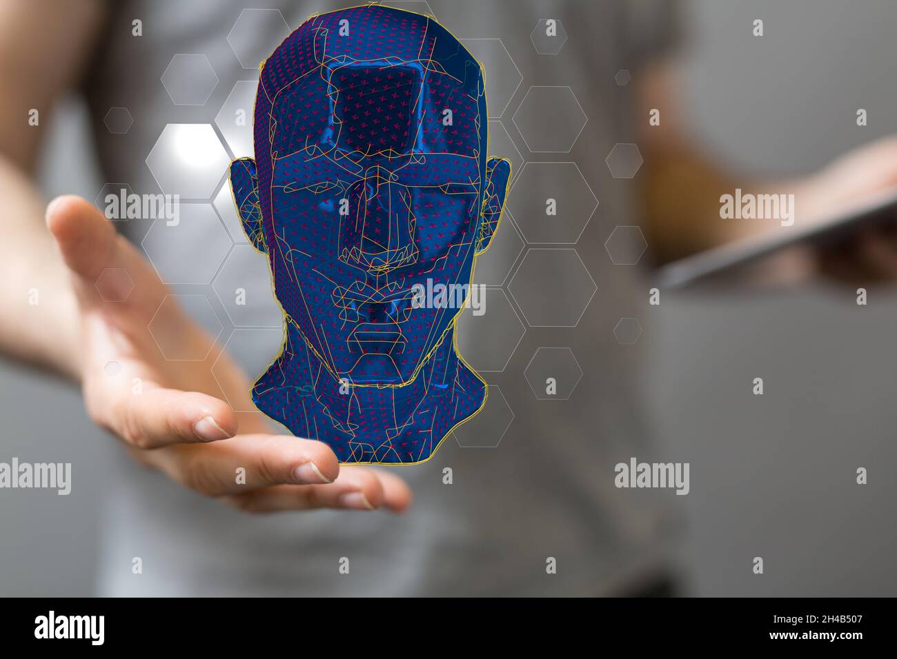 3D rendering of a floating human head on a man's hand - Artificial ...