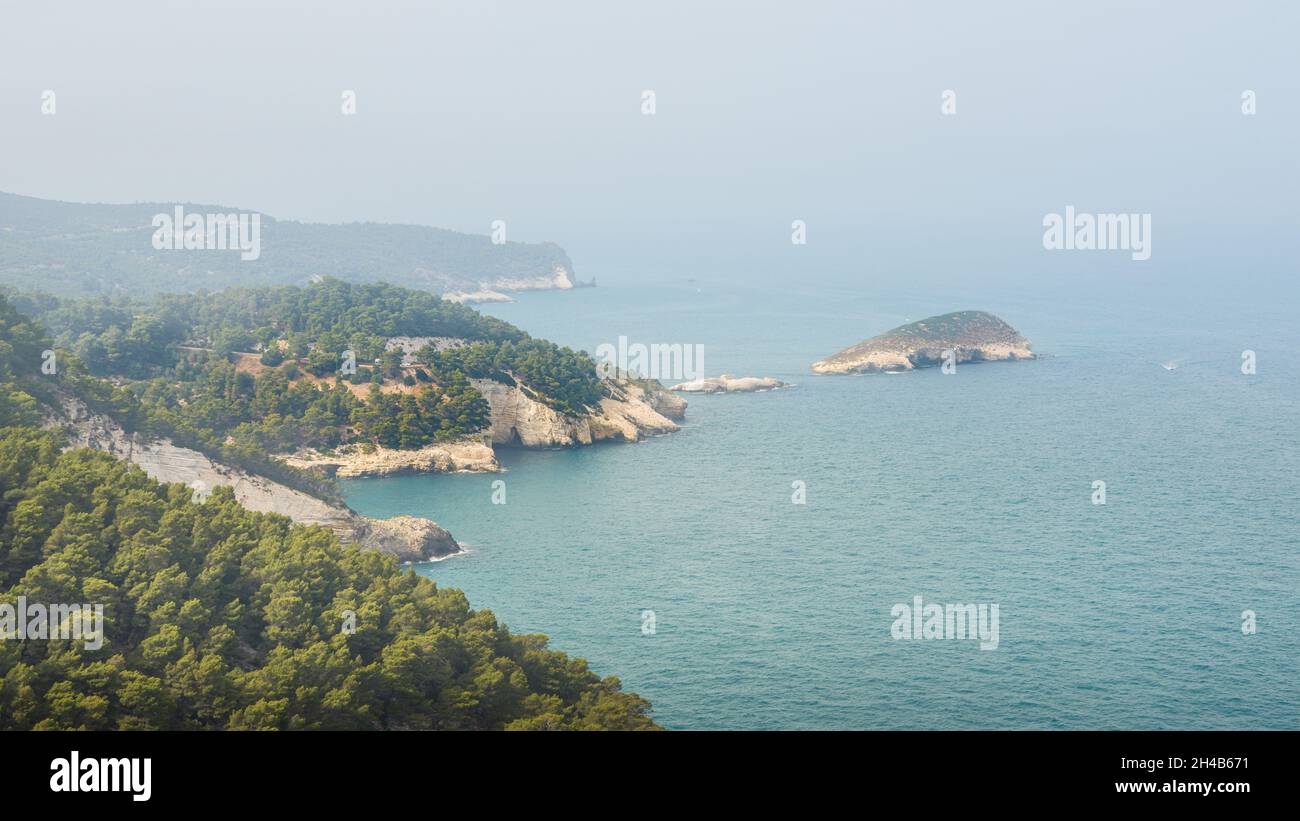 Panorama seascape of Apulian coastline with natural arch formation and ...