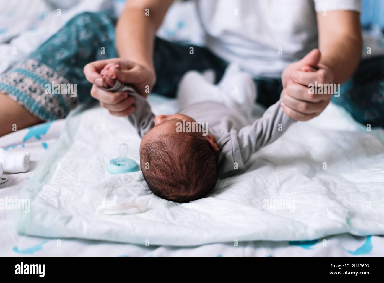 Baby arms hi-res stock photography and images - Alamy