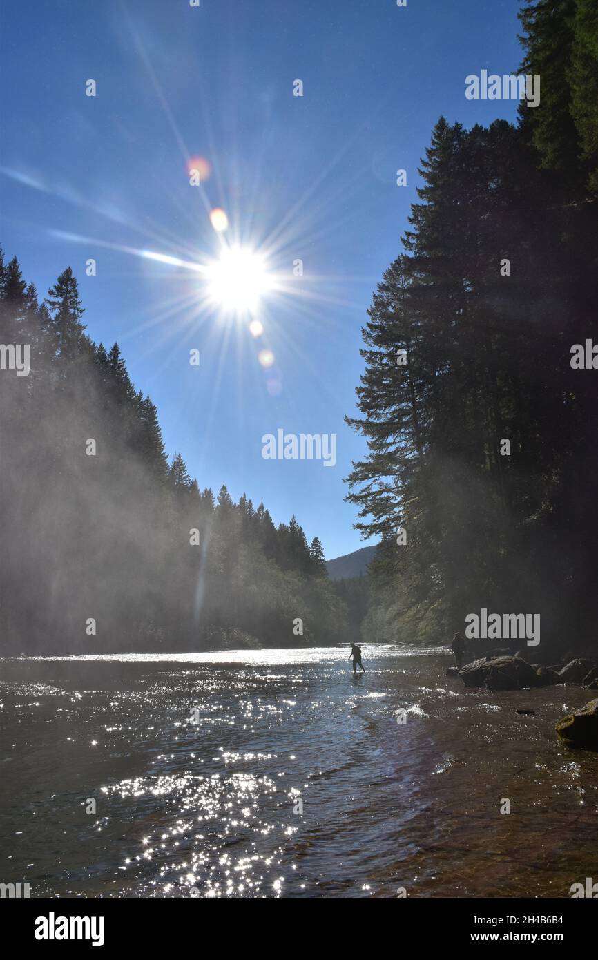 A couple enjoys an idyllic late summer day at the Lower Lewis River ...