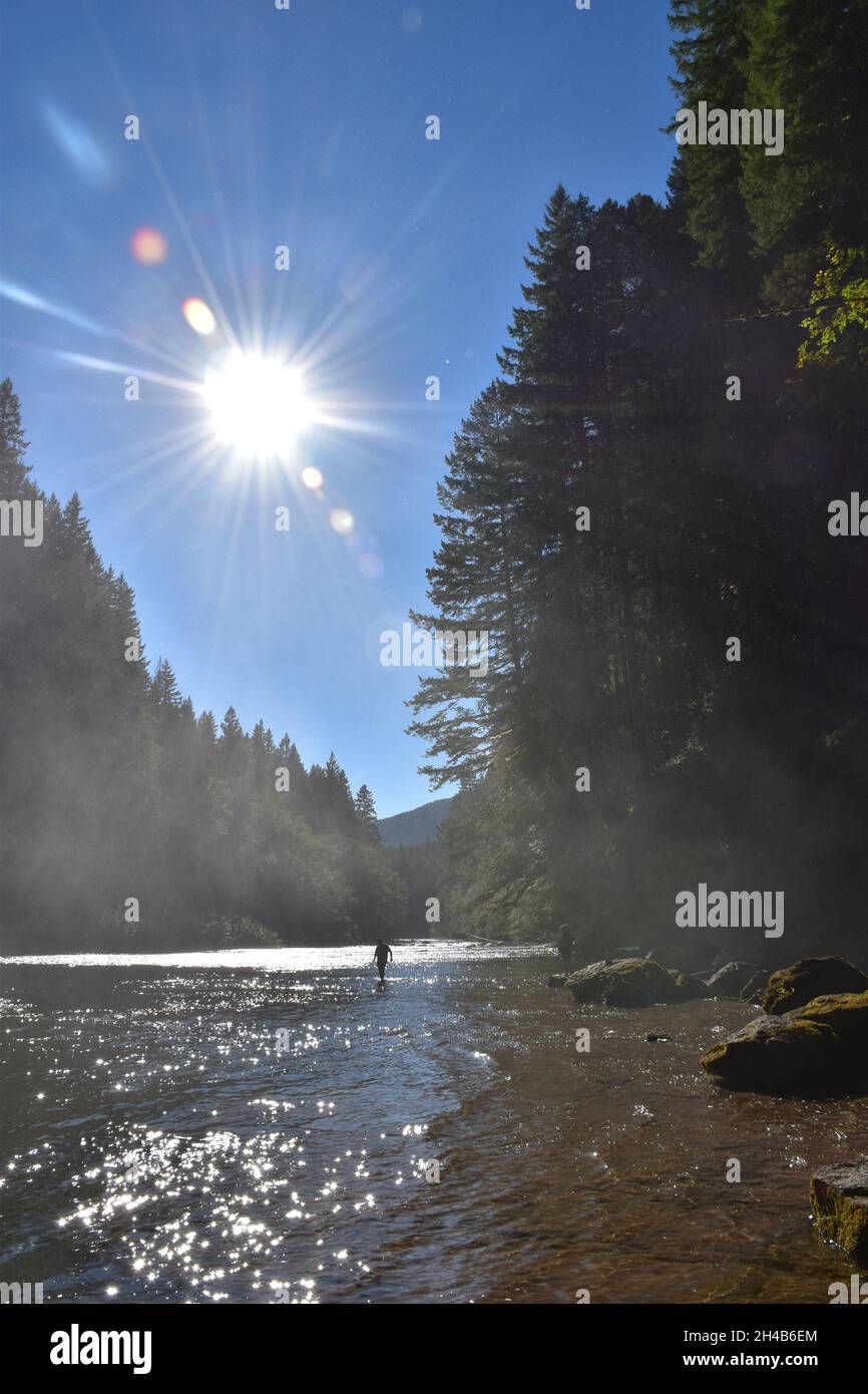 A couple enjoys an idyllic late summer day at the Lower Lewis River ...
