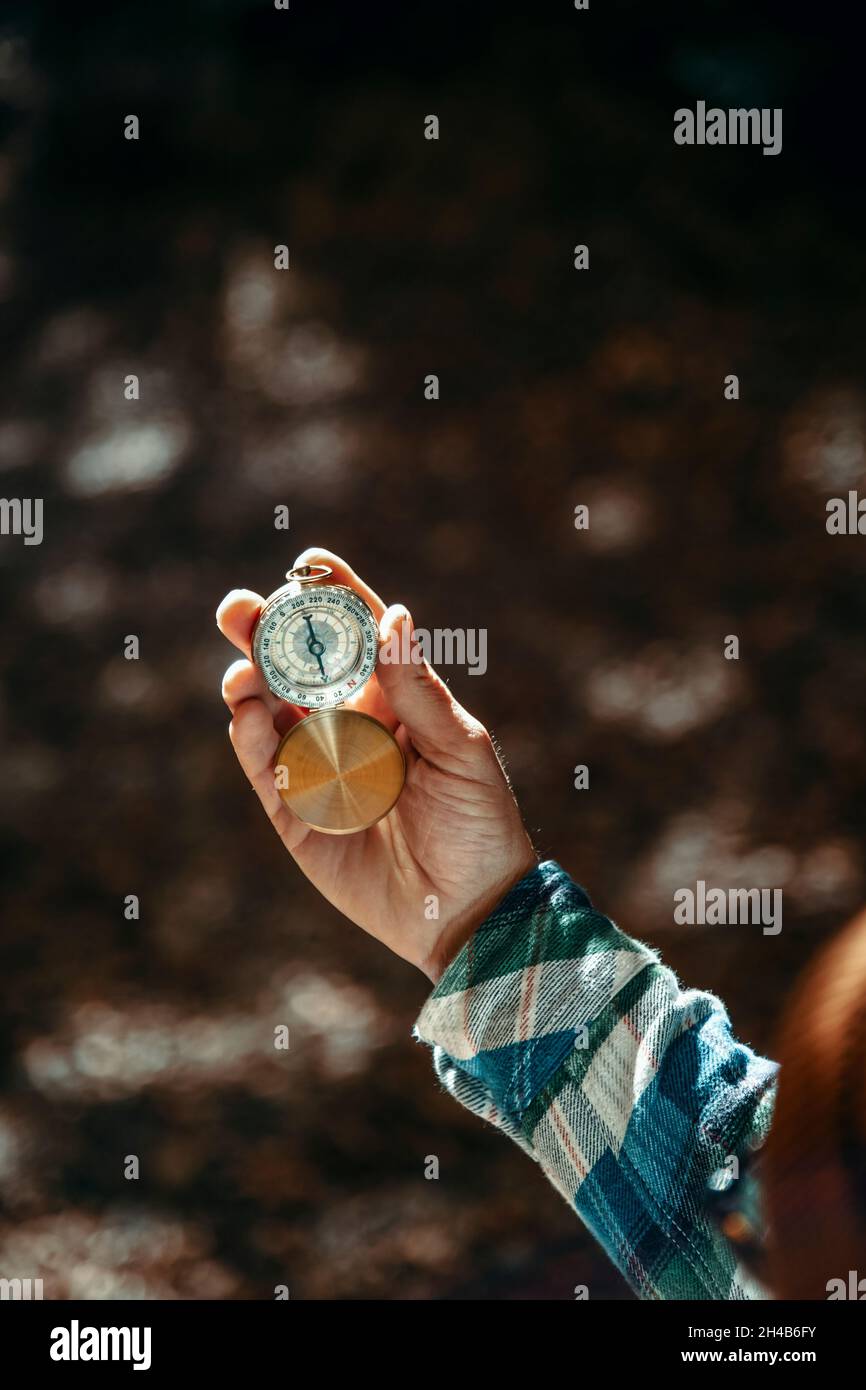 Person with compass hi-res stock photography and images - Alamy