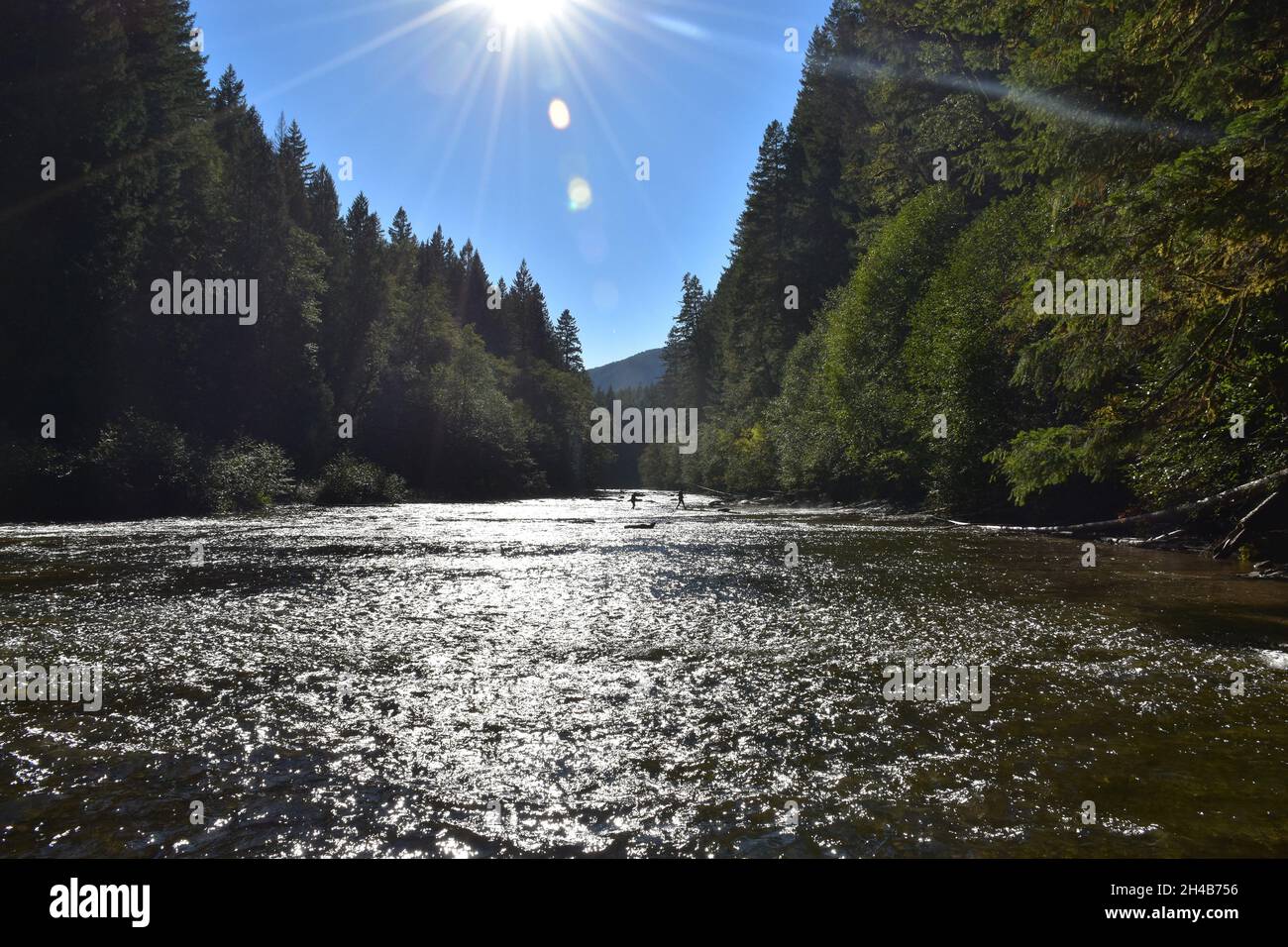 A couple enjoys an idyllic late summer day at the Lower Lewis River ...