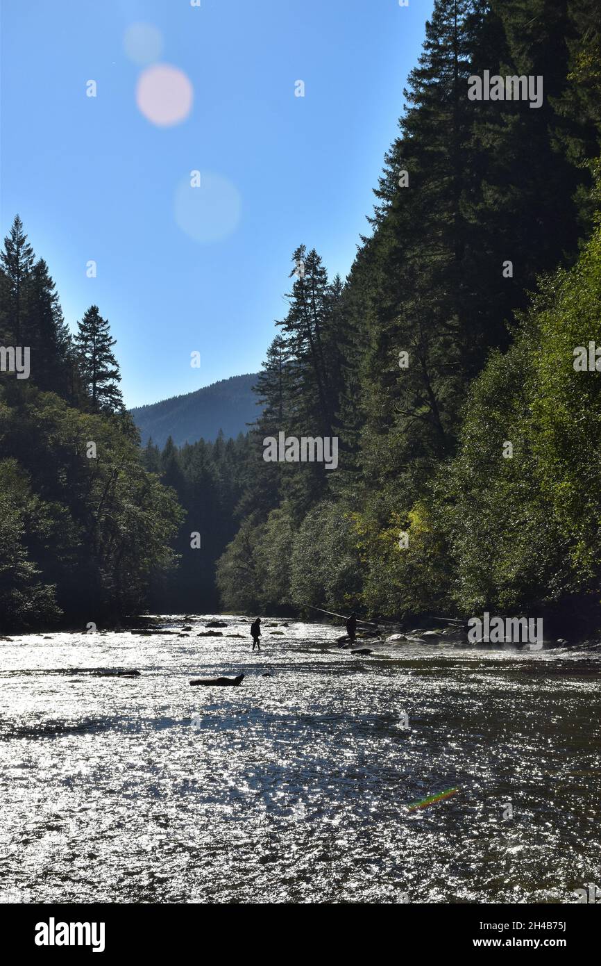 A couple enjoys an idyllic late summer day at the Lower Lewis River ...