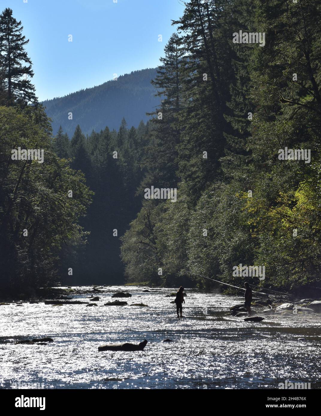 A couple enjoys an idyllic late summer day at the Lower Lewis River ...