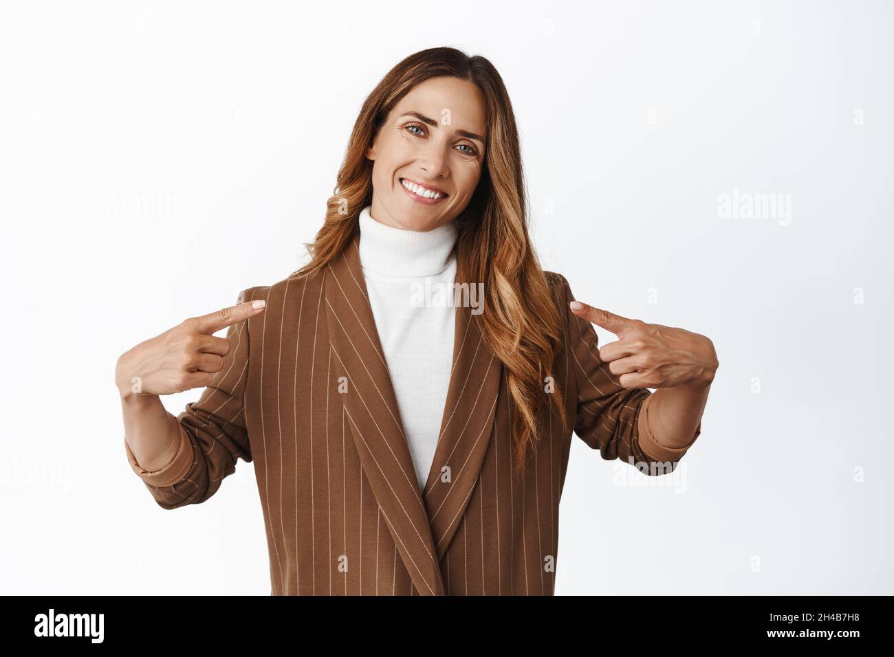 Successful smiling female entrepreneur, businesswoman pointing fingers ...