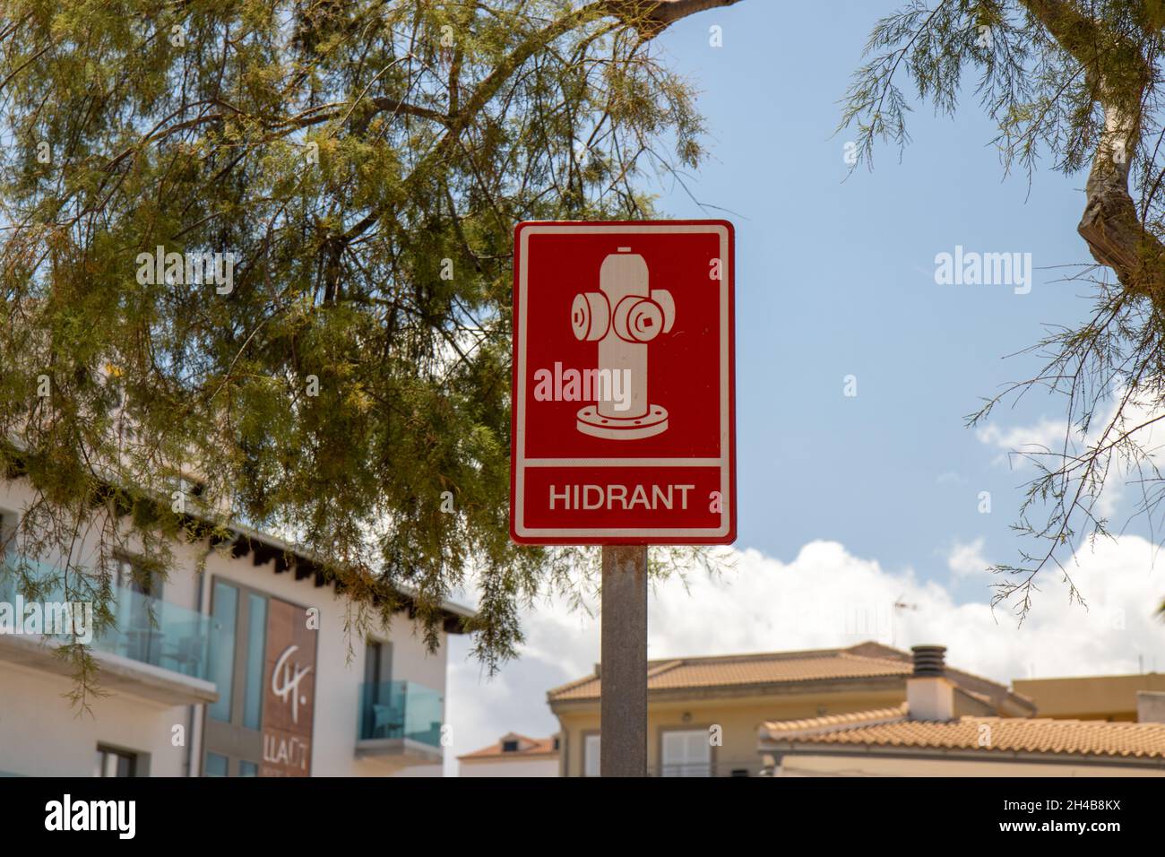A red Fire Hydrant sign taken on the beautiful island of Majorca in ...