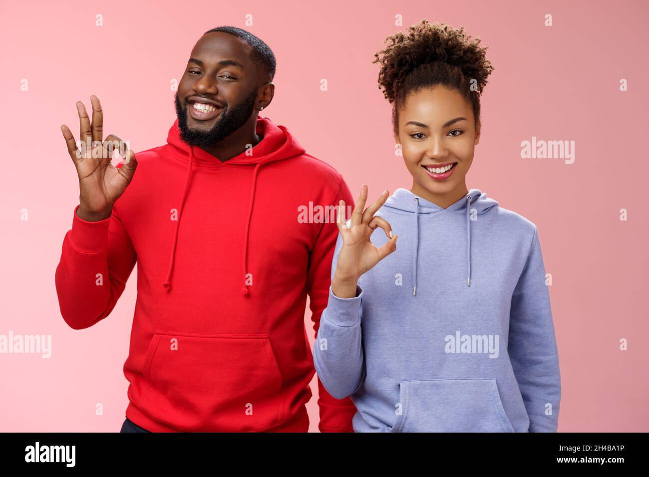 Two african-american skilful coworkers professionals assured friend ...