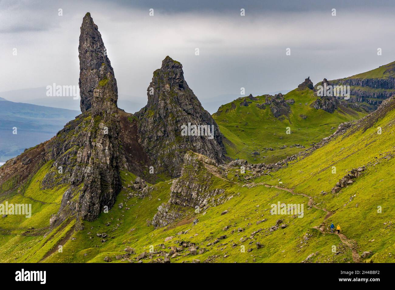 Walkers and hikers on the dramatic mountains of the Trotternish Ridge ...