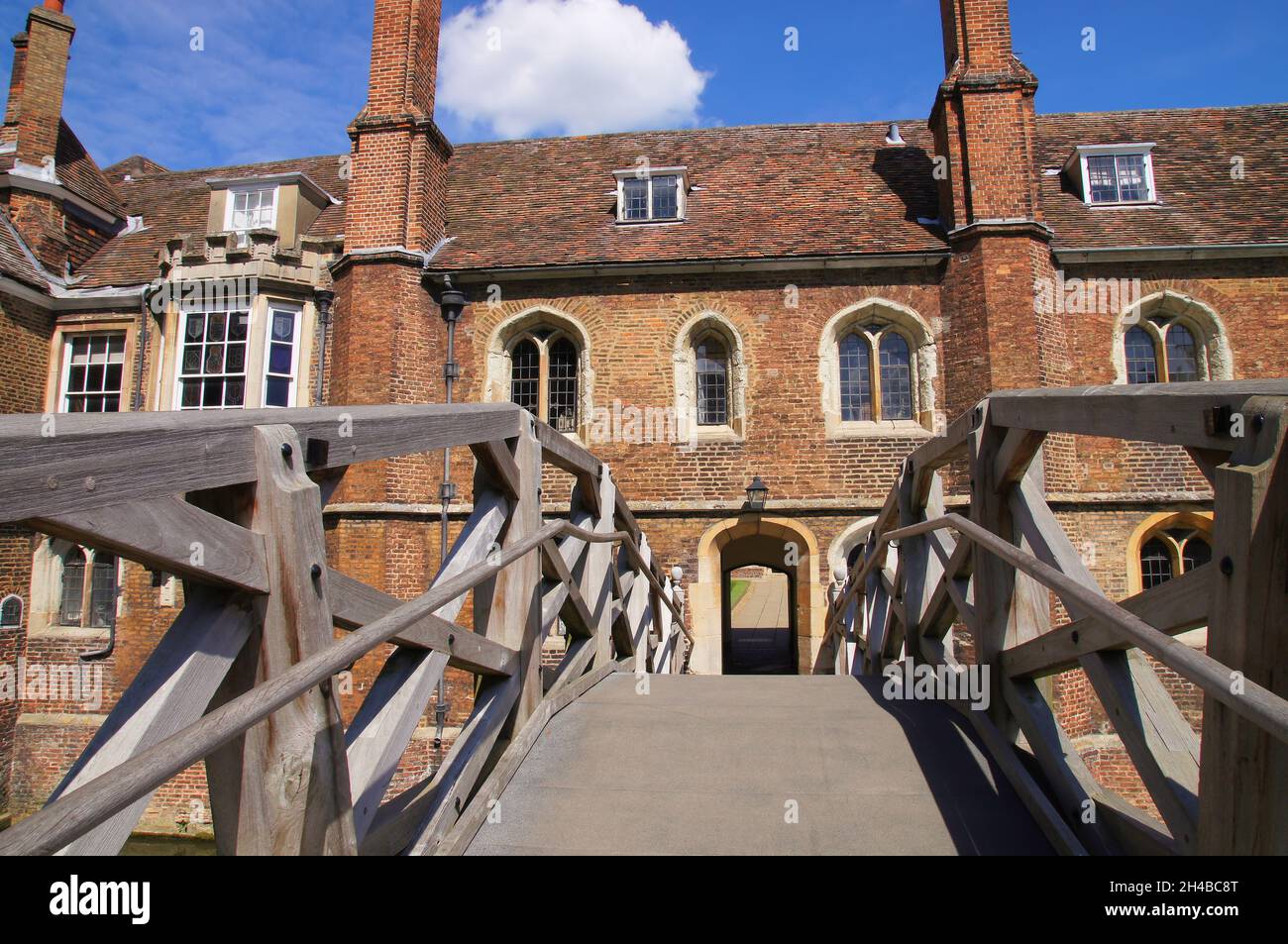 Standing on the wooden Mathematical Bridge crossing the Cam River and ...