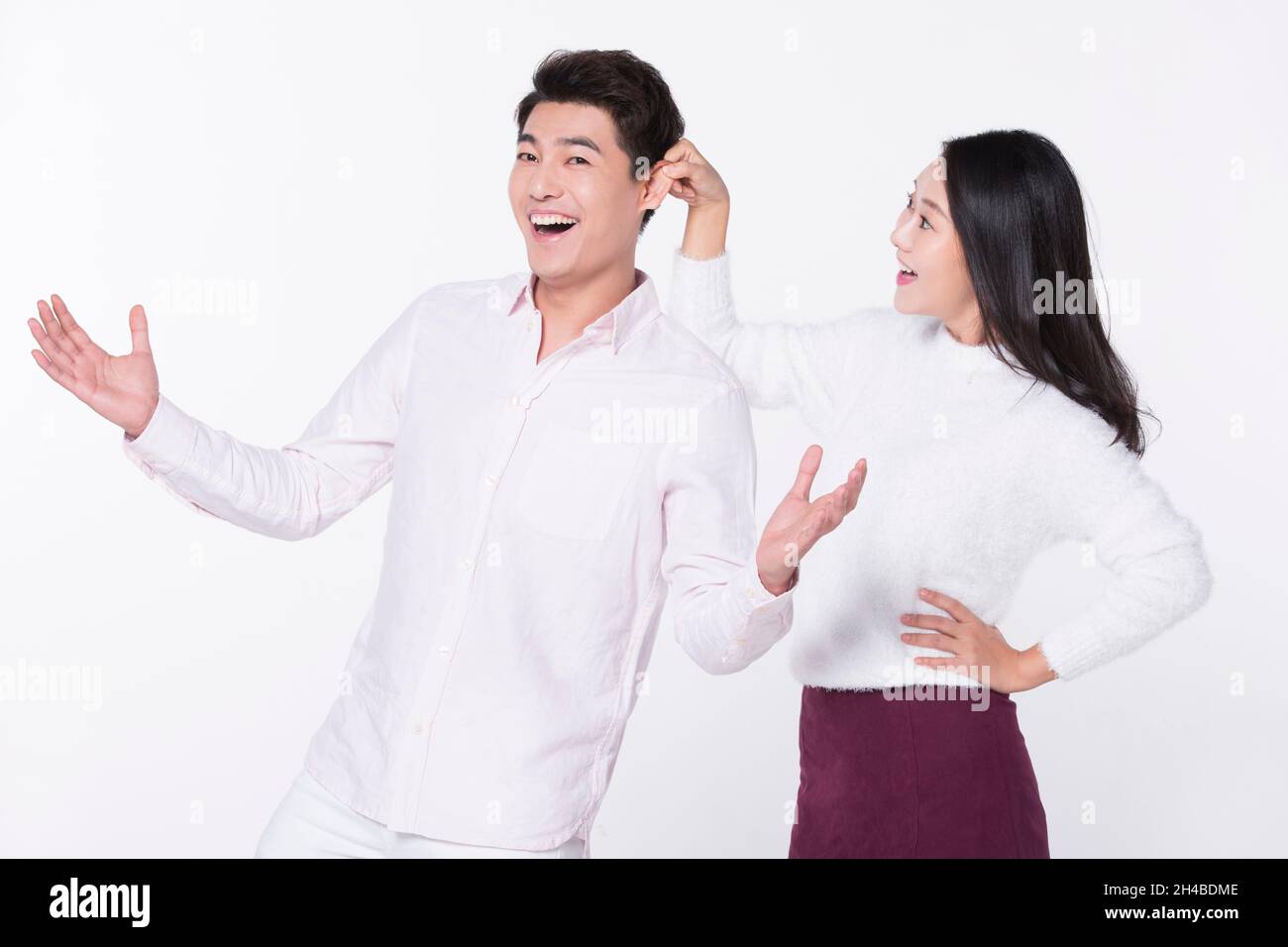 Ear pulling hi-res stock photography and images - Alamy