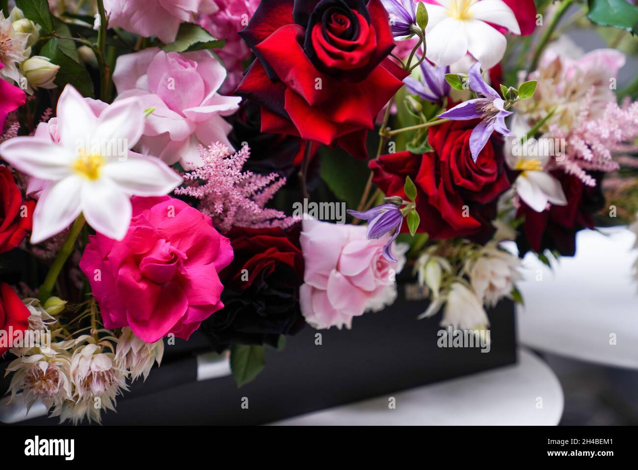 Creative layout of flowers and leaves. The concept of nature. A card ...