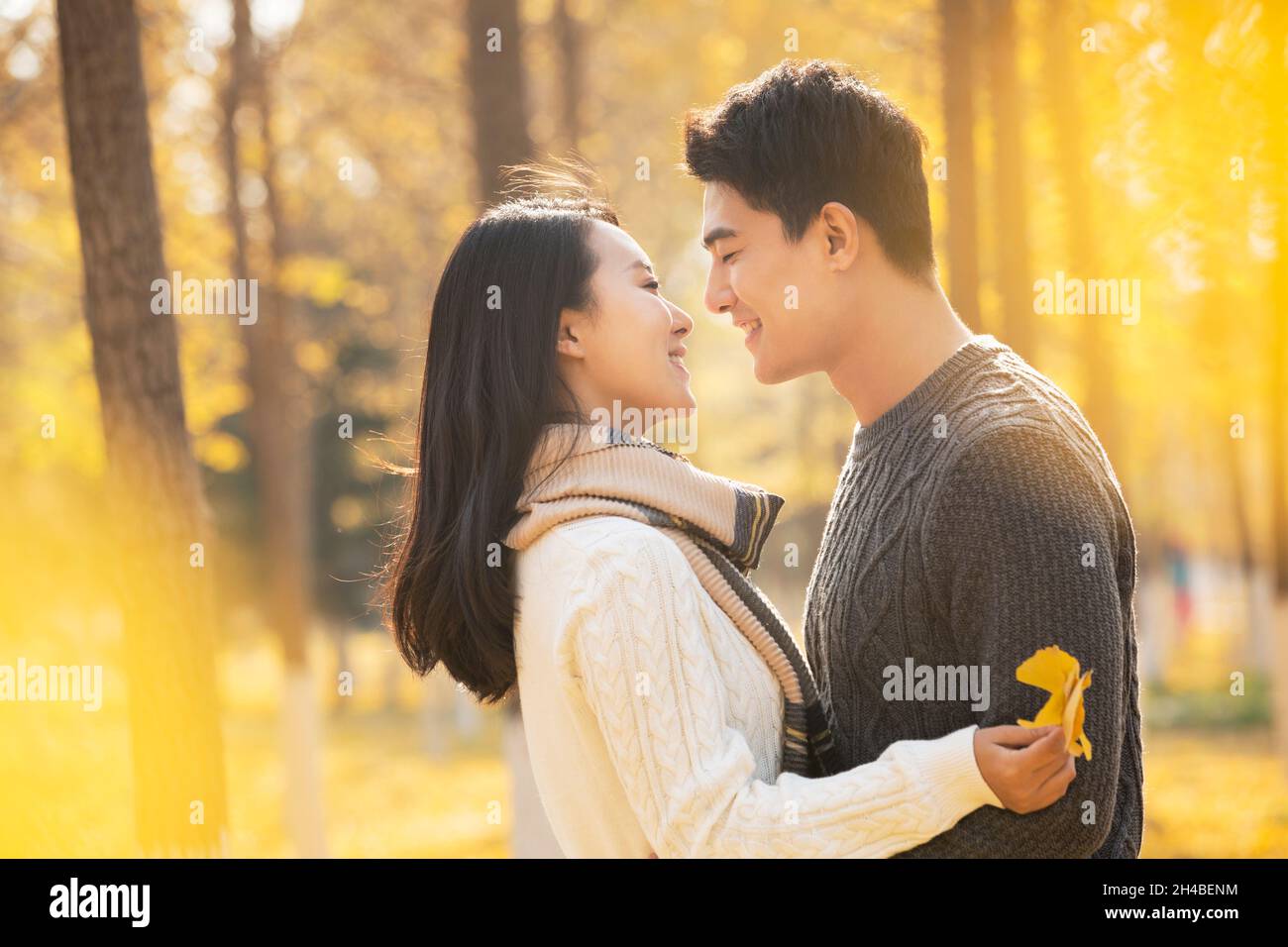 Happy and sweet young couple Stock Photo - Alamy
