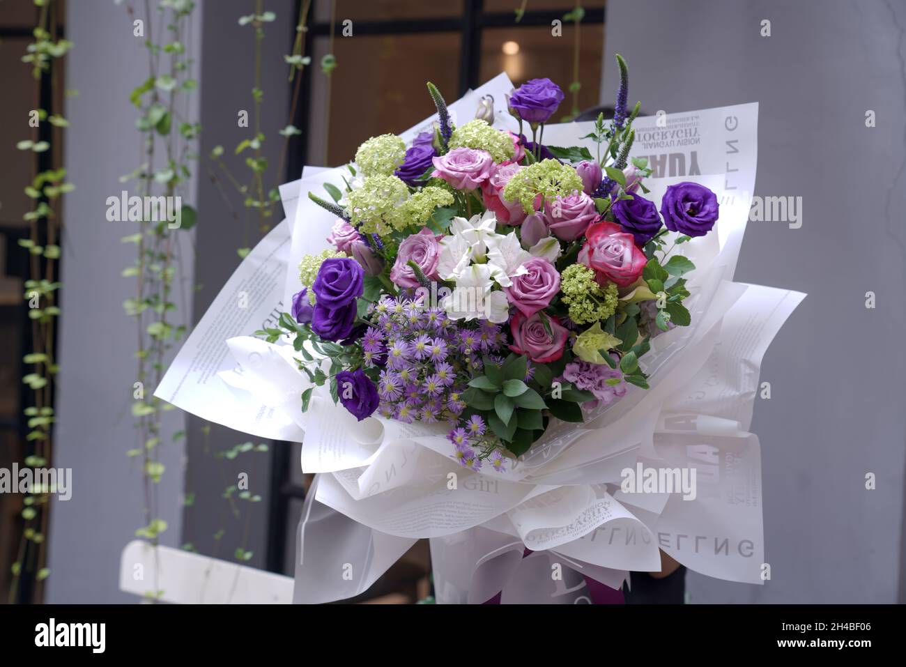 Creative layout of flowers and leaves. The concept of nature. A card ...