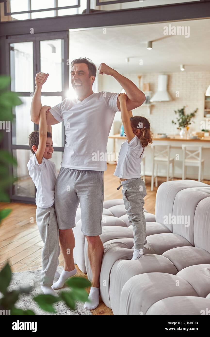 Father Son Showing Muscles High Resolution Stock Photography and Images ...