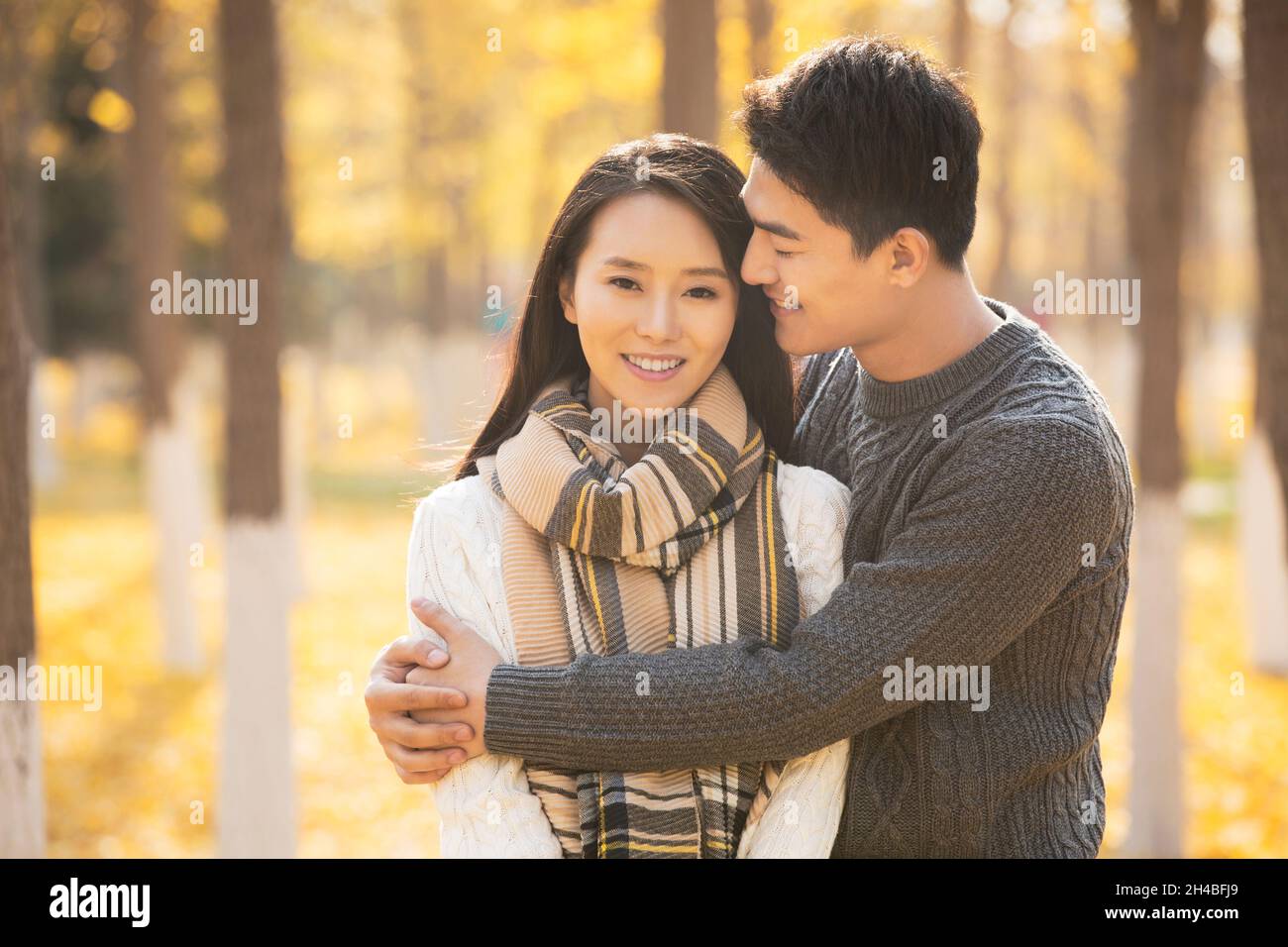 Happy and sweet young couple Stock Photo - Alamy