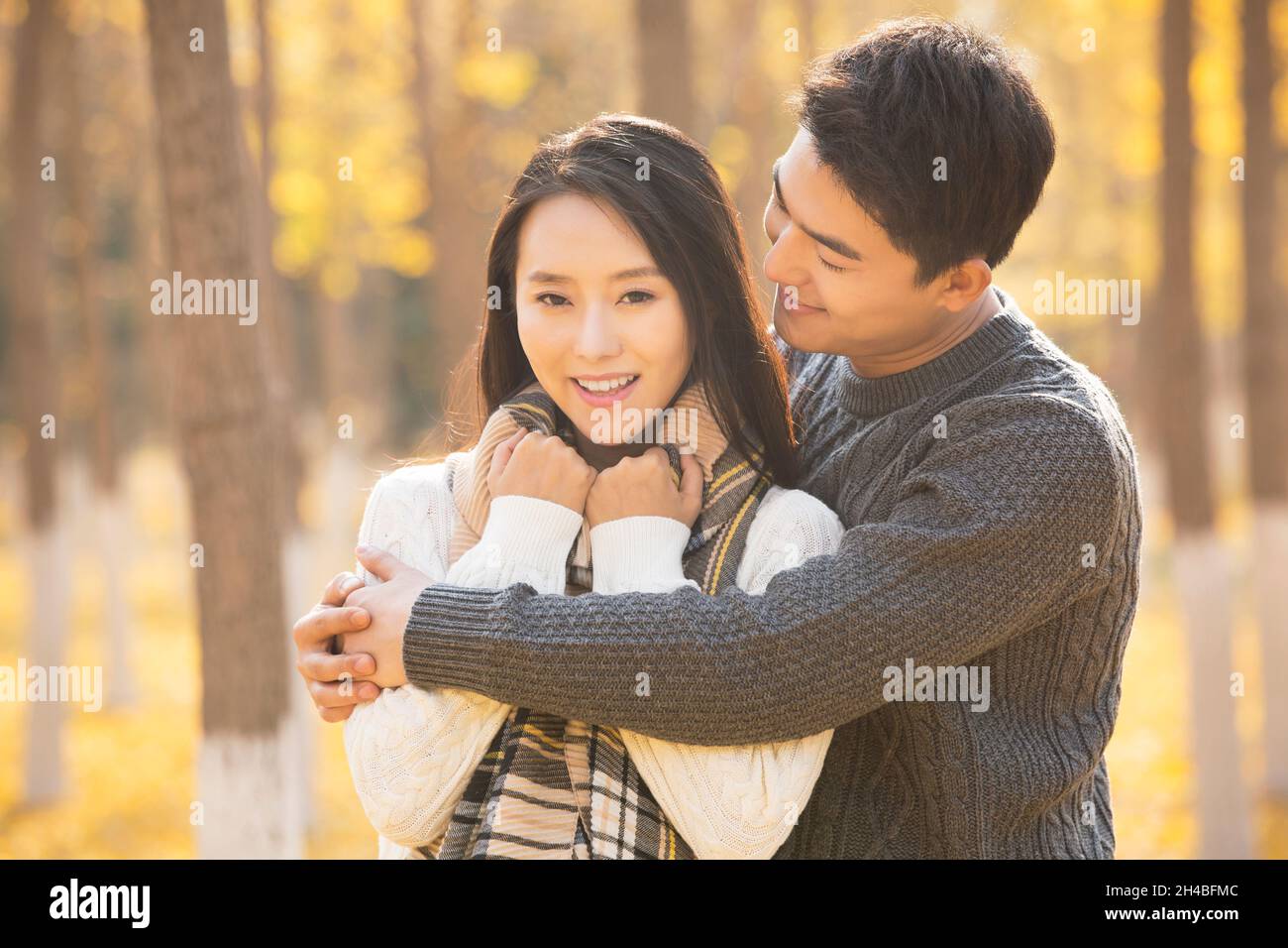 Happy and sweet young couple Stock Photo - Alamy