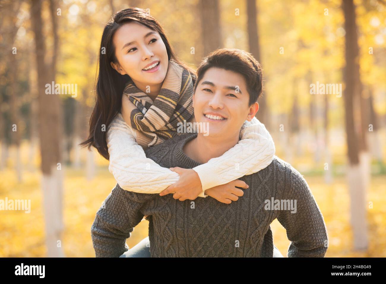 Happy and sweet young couple Stock Photo - Alamy