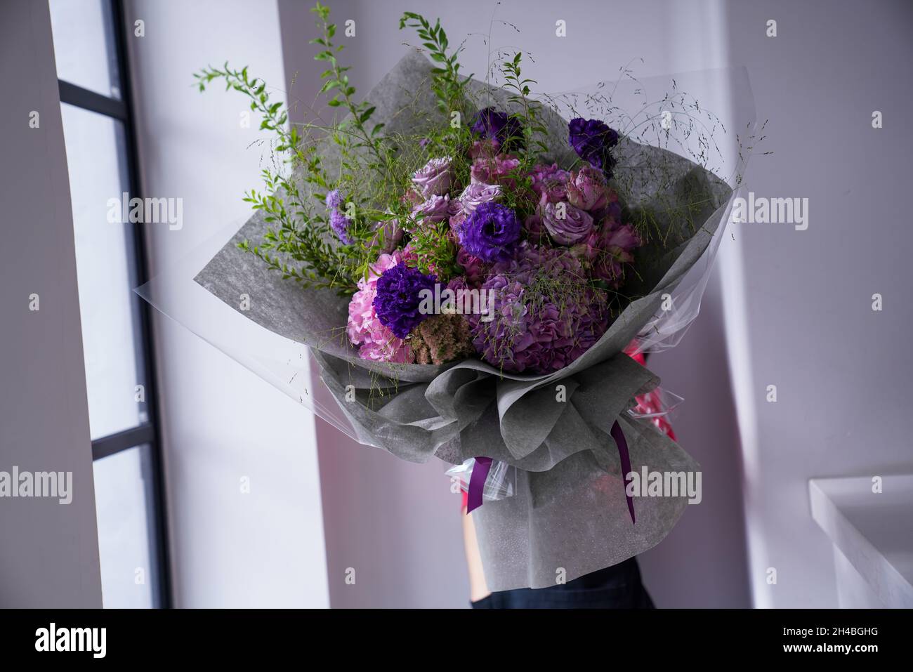 Creative layout of flowers and leaves. The concept of nature. A card ...