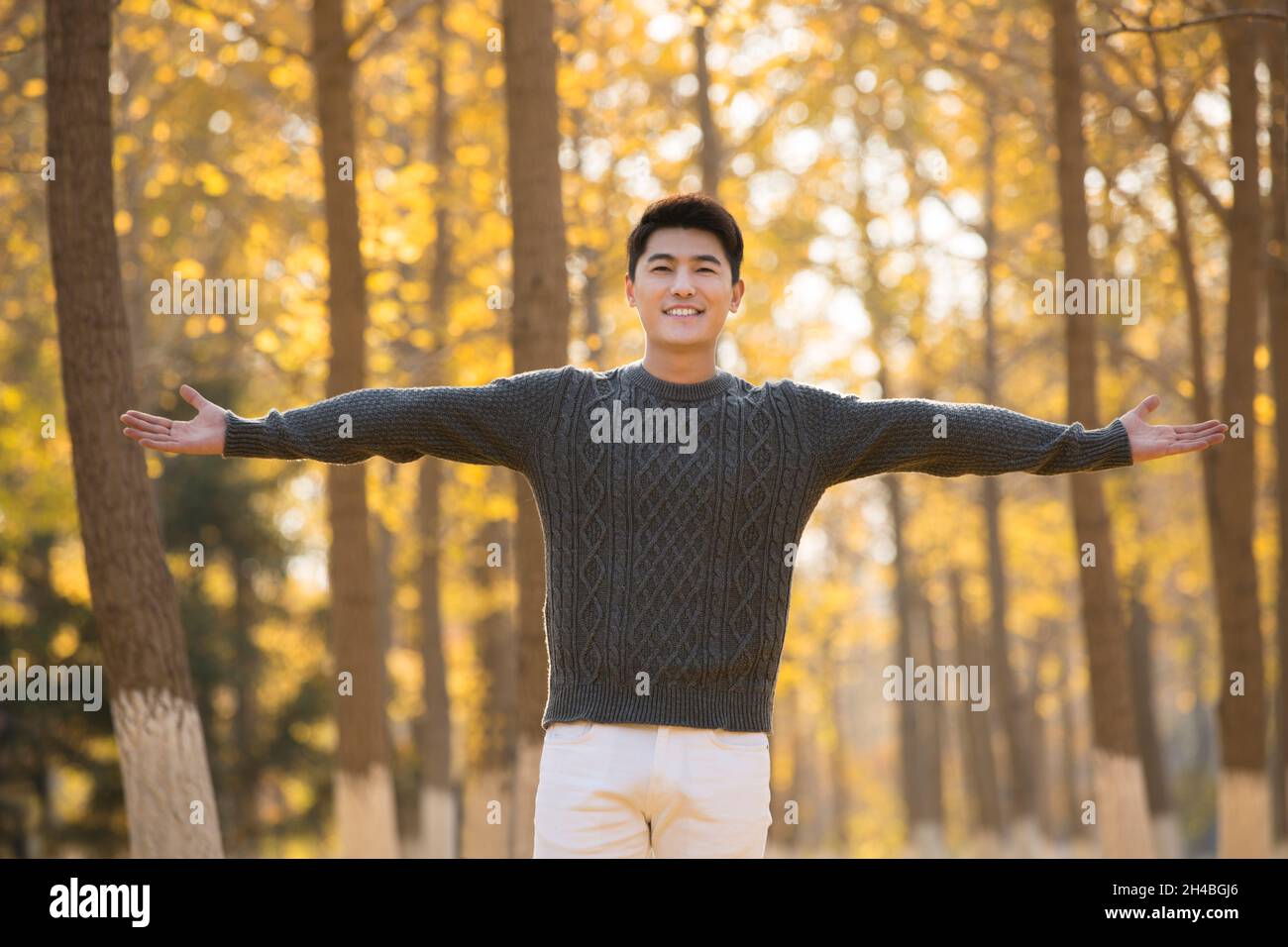 Happy and handsome young man Stock Photo - Alamy