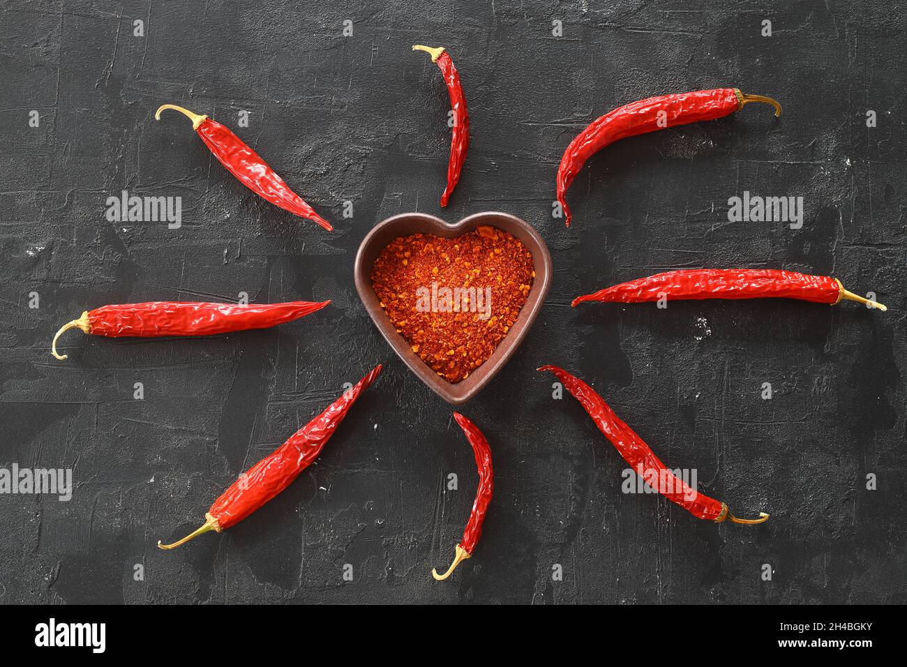 Hot chilli in heart shape hi-res stock photography and images - Alamy