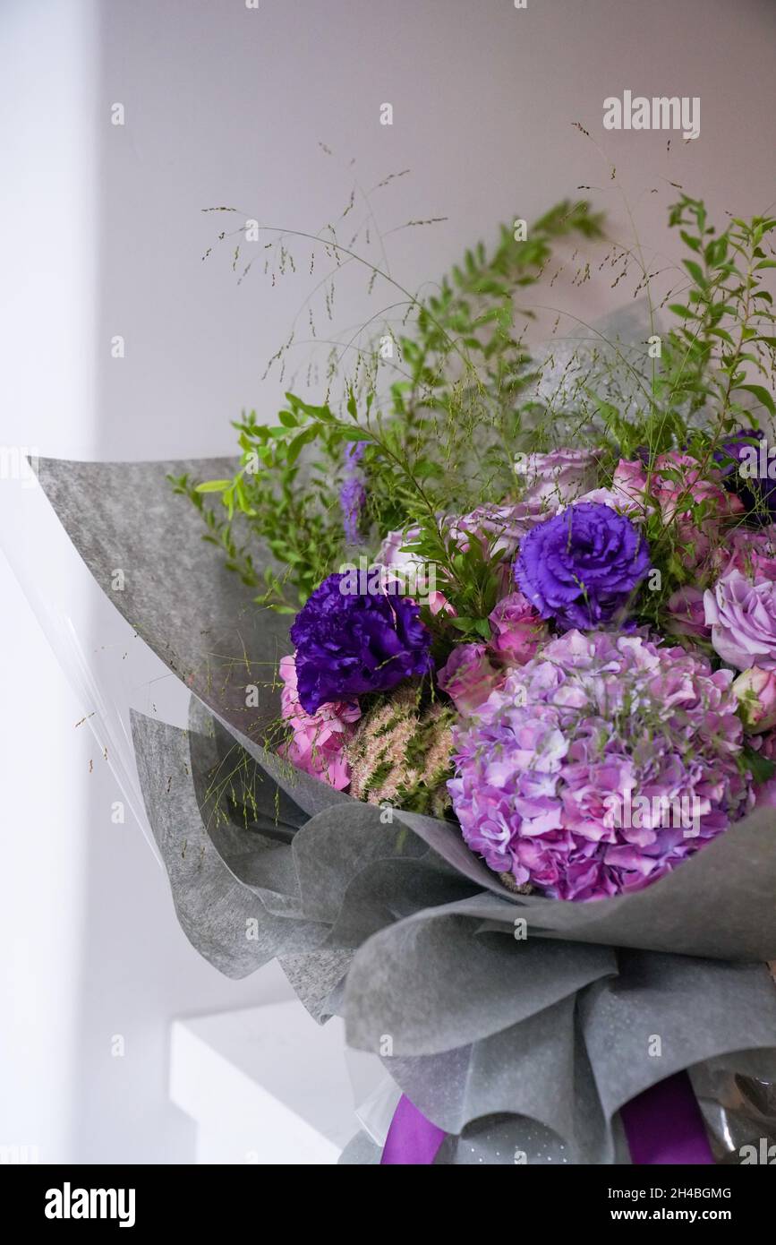 Creative layout of flowers and leaves. The concept of nature. A card ...