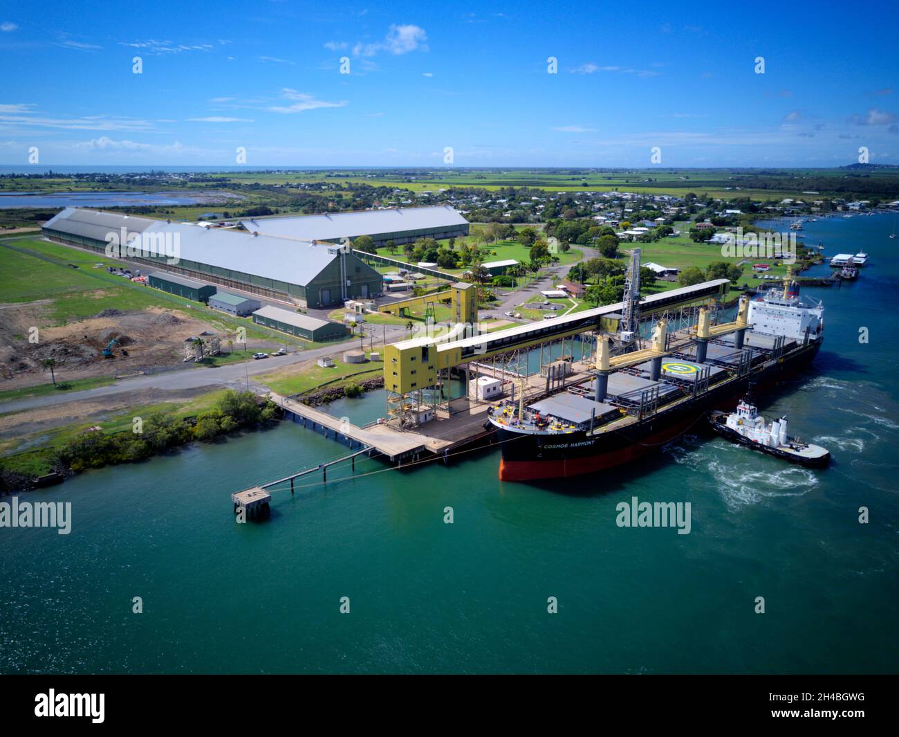 Aerial of MV Cosmo Harmony 12 cargo vessel departing with a load of raw ...