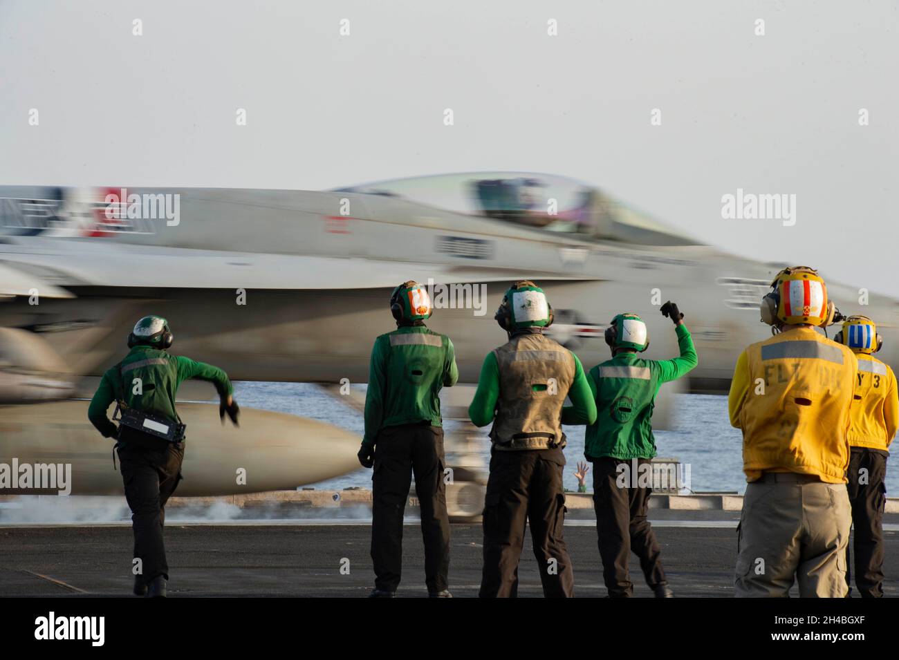 210518-N-QC790-1045 ARABIAN SEA (May 18, 2021) - Sailors observe launch ...