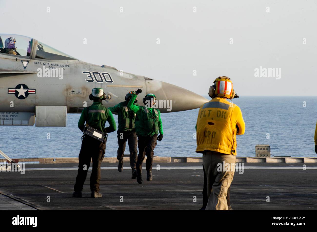 210518-N-QC790-1038 ARABIAN SEA (May 18, 2021) - Sailors prepare an F/A ...