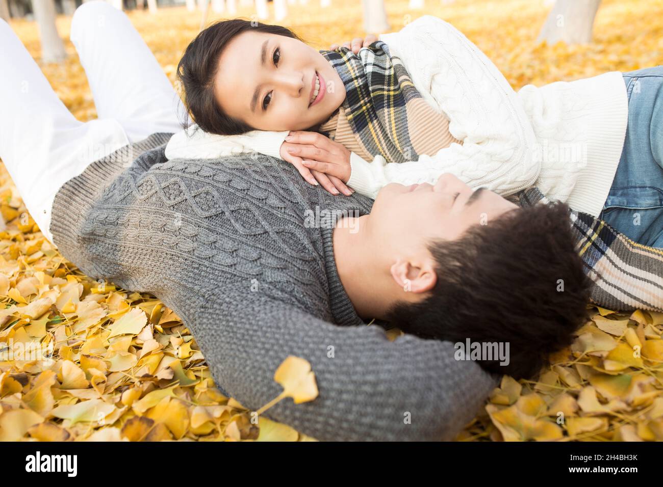 Happy and sweet young couple Stock Photo - Alamy