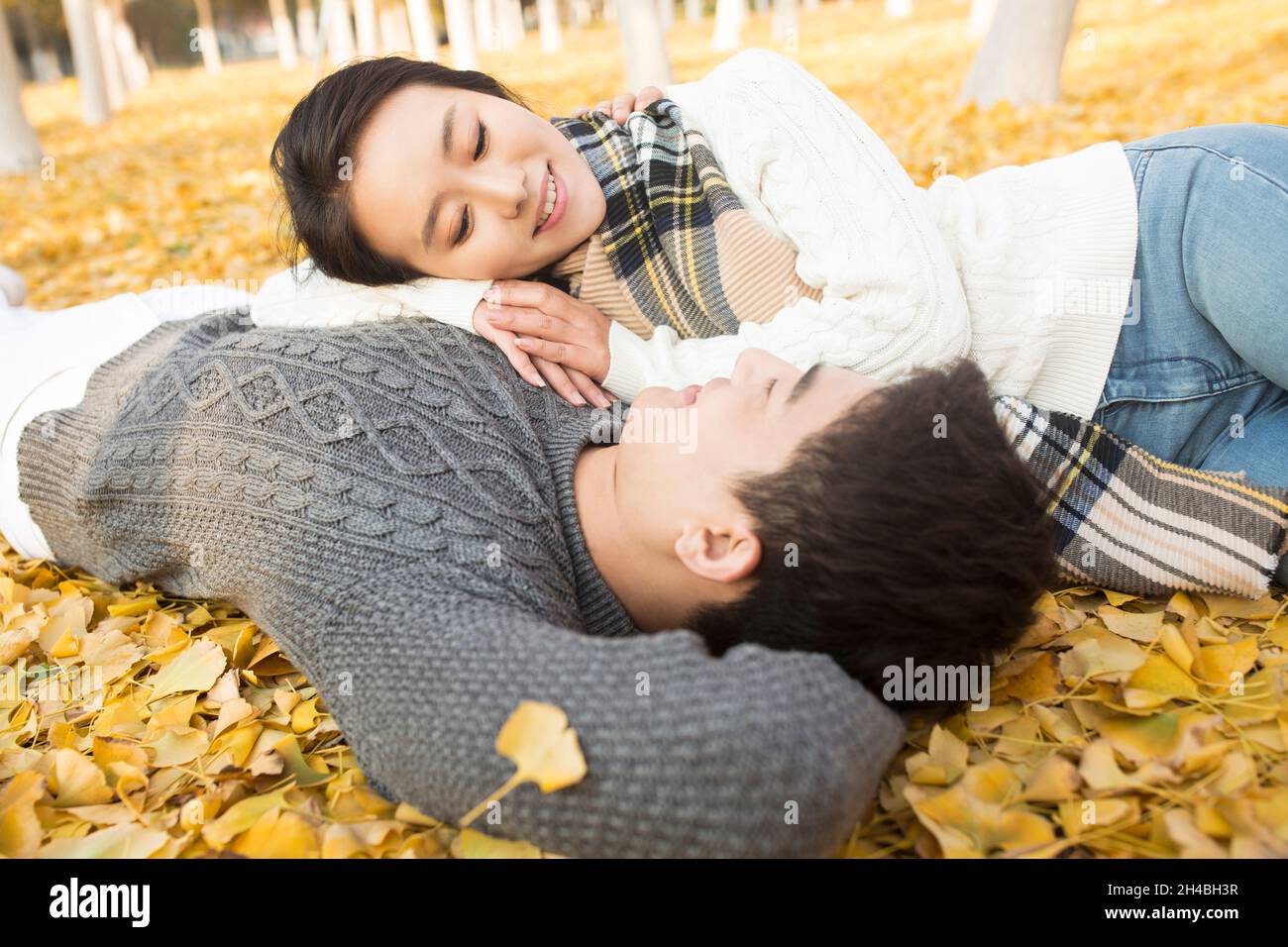 Happy and sweet young couple Stock Photo - Alamy