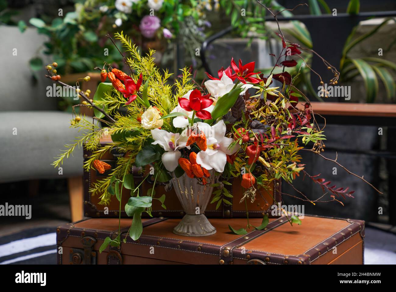 Creative layout of flowers and leaves. The concept of nature. A card ...