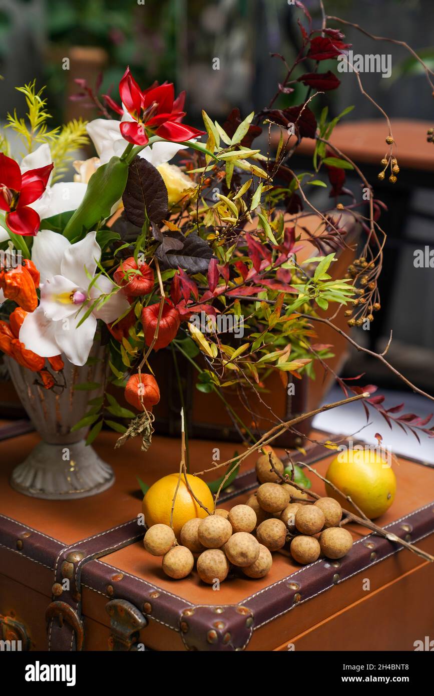 Creative layout of flowers and leaves. The concept of nature. A card with flowers. Colorful ...