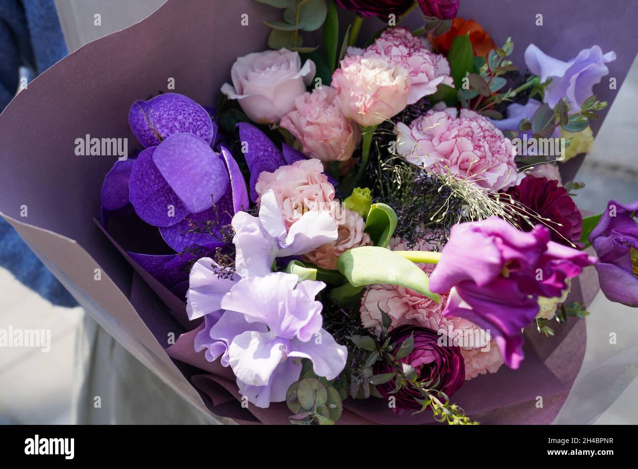 Creative layout of flowers and leaves. The concept of nature. A card ...