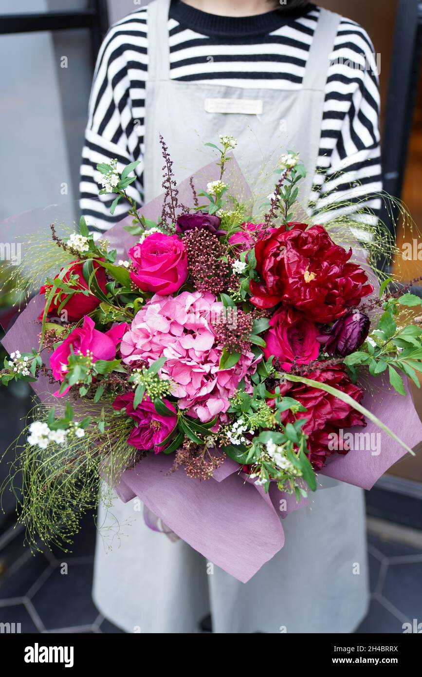 Creative layout of flowers and leaves. The concept of nature. A card ...