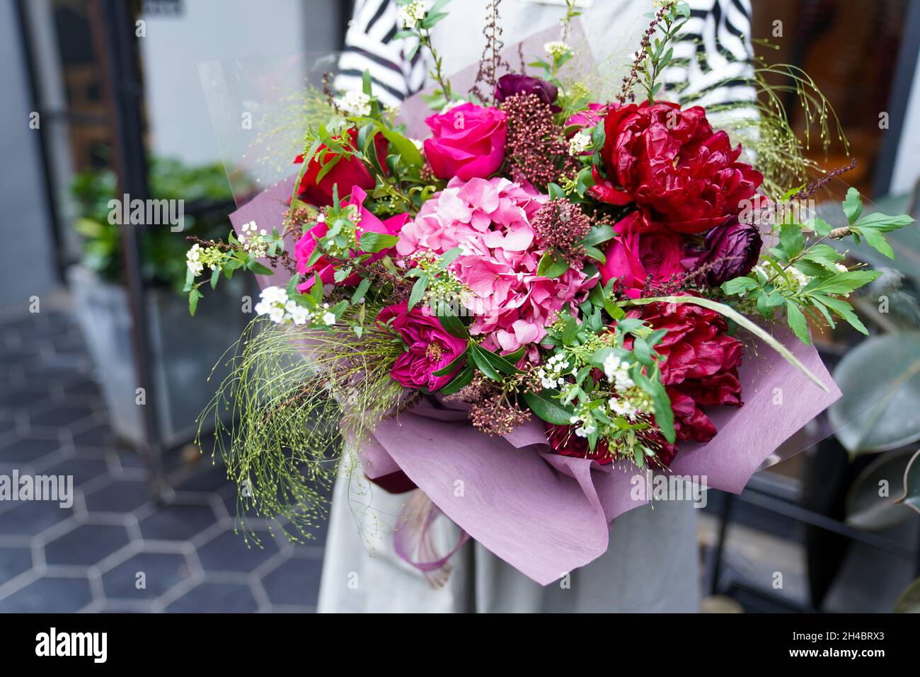 Creative layout of flowers and leaves. The concept of nature. A card ...