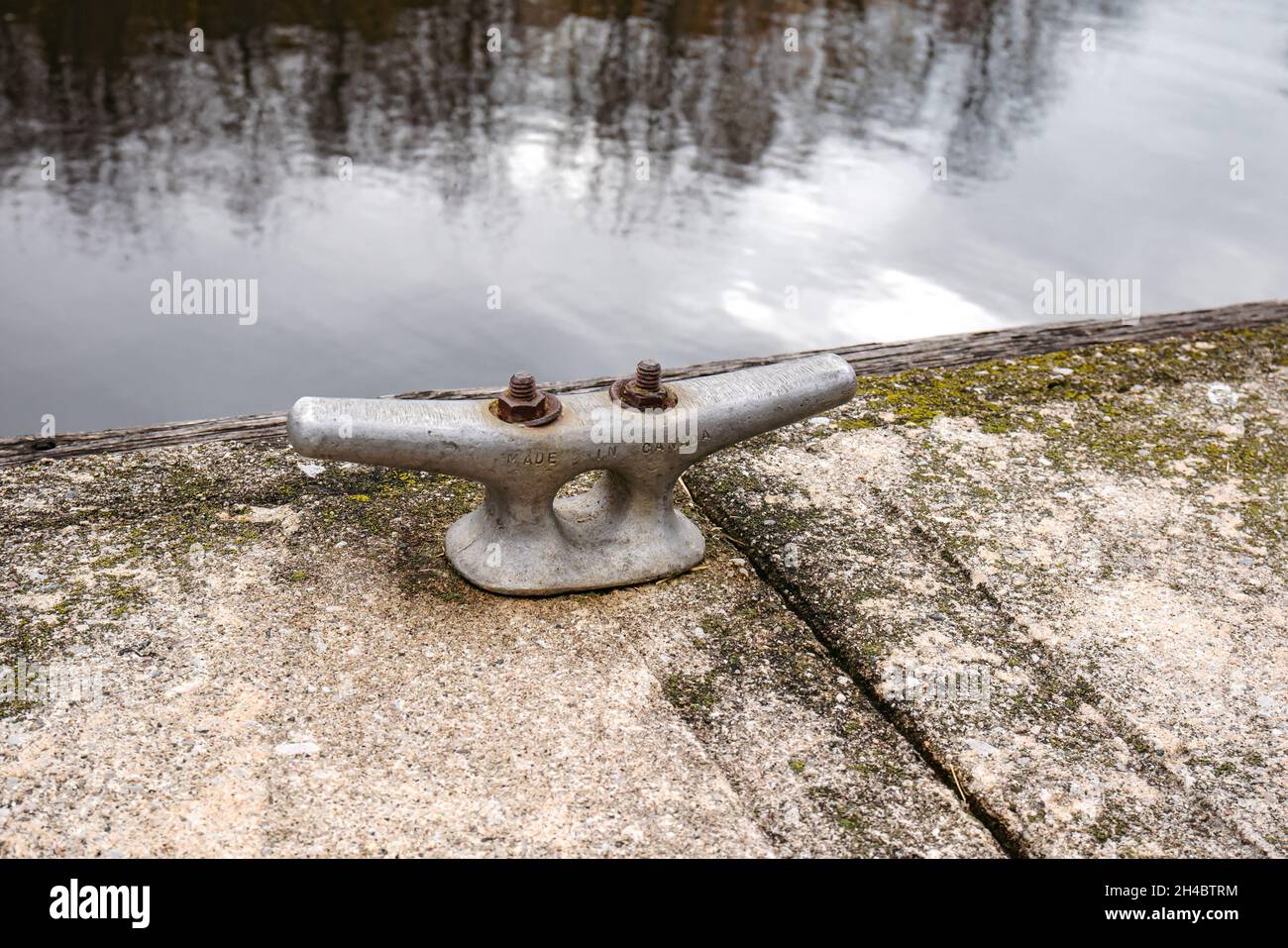 open base cleat made in Canada by the side of a river Stock Photo - Alamy