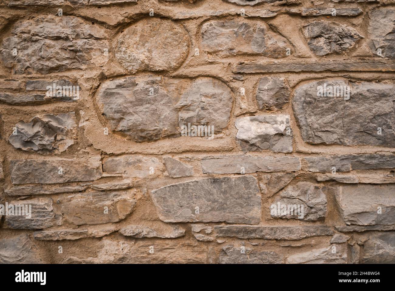Stone wall structure of an old house Stock Photo - Alamy