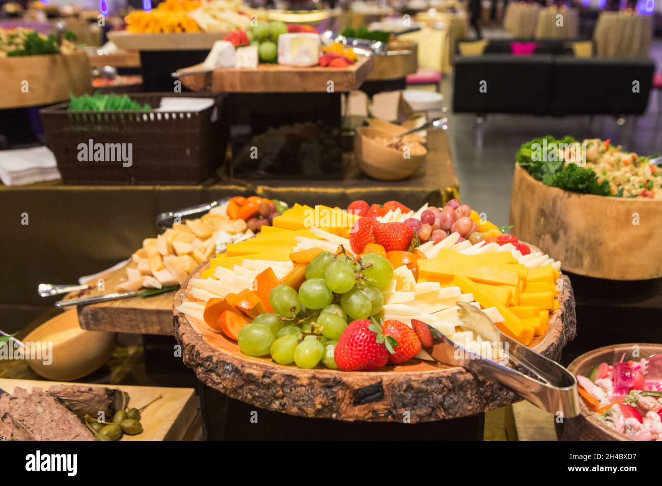 A cheese buffet is set up at an event Stock Photo - Alamy