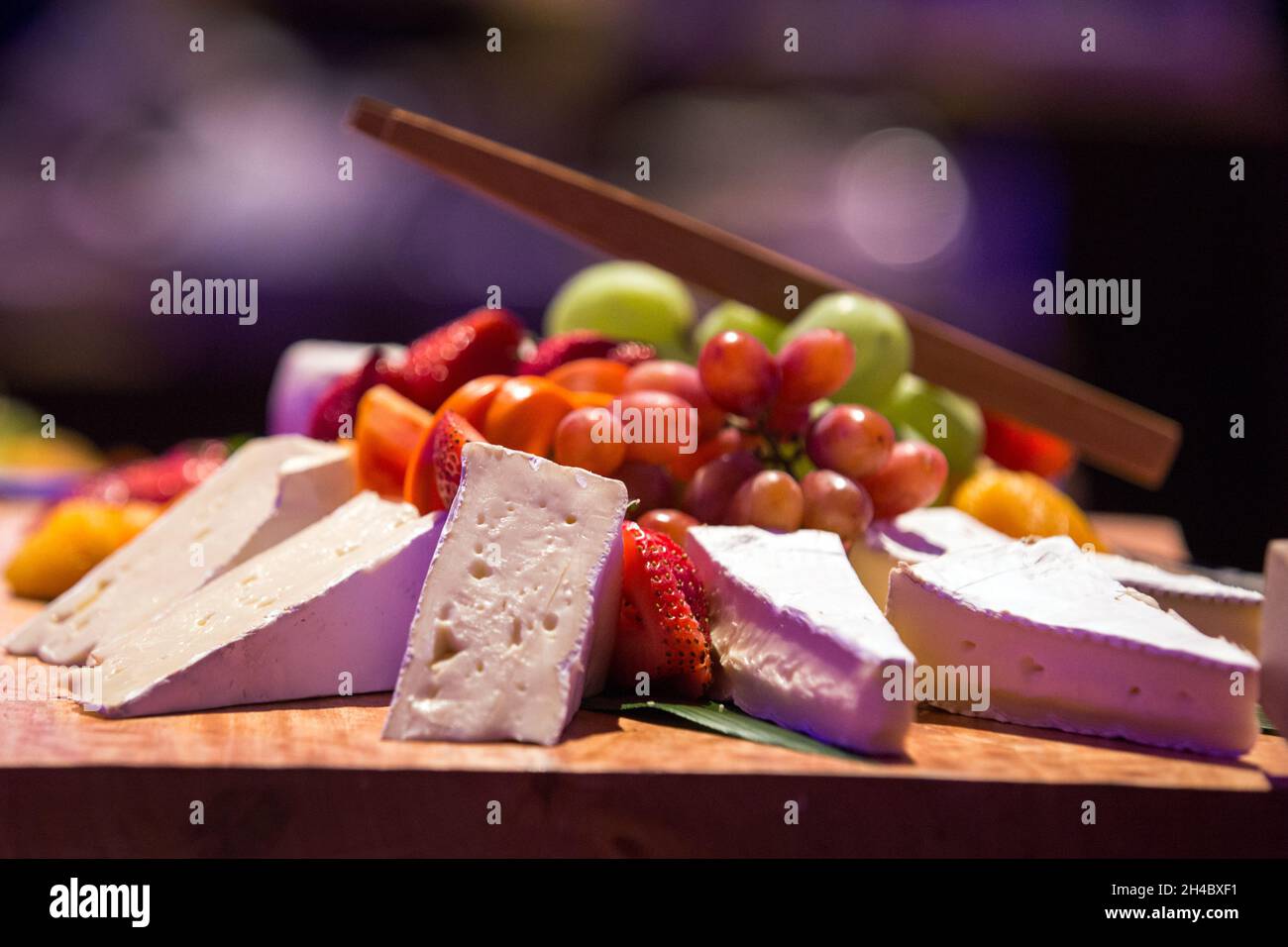 A cheese buffet is set up at an event Stock Photo - Alamy