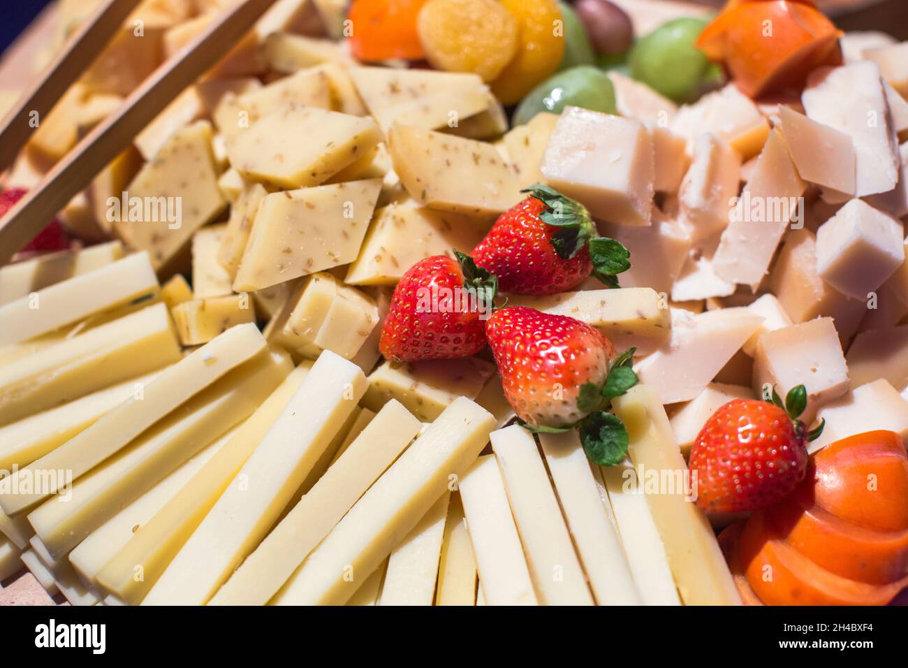 A cheese buffet is set up at an event Stock Photo - Alamy