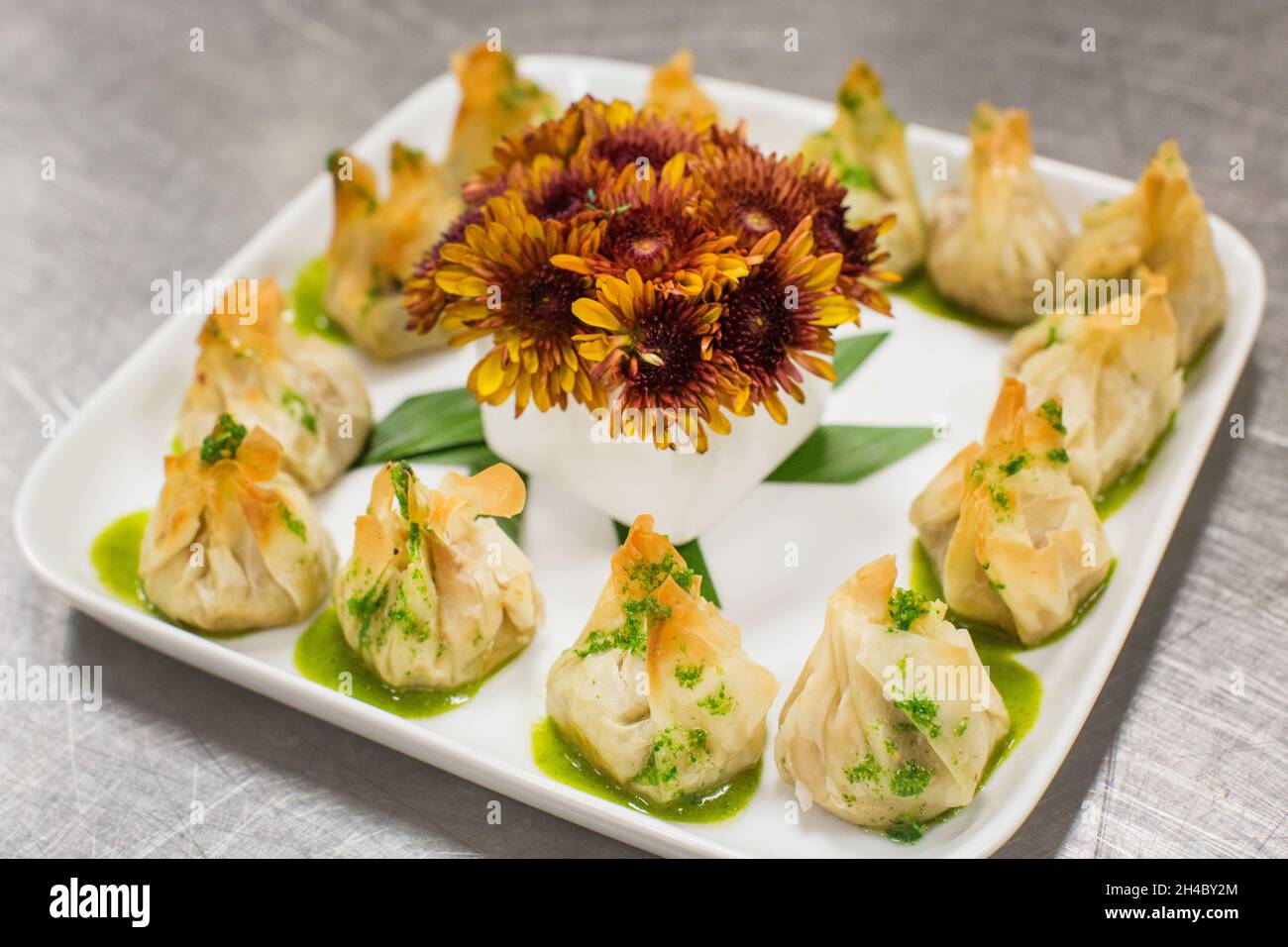 An hors d'oeuvre, appetizers are being passed at an event Stock Photo ...