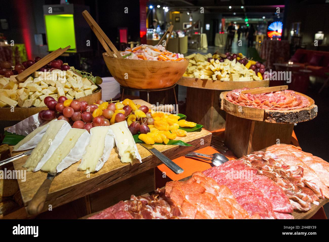 A cheese buffet is set up at an event Stock Photo - Alamy