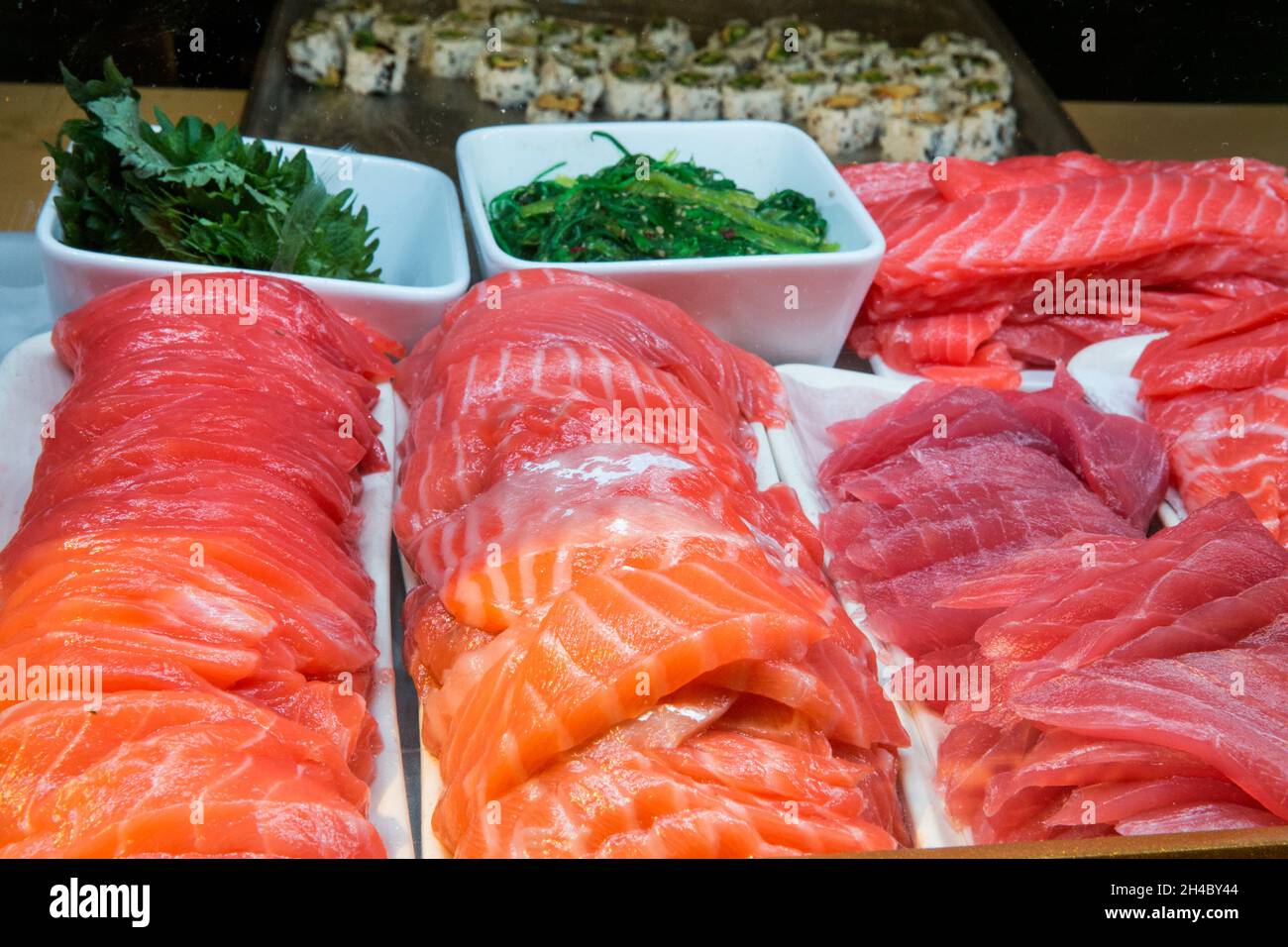 Raw fish is arranged at a sushi bar at an event Stock Photo - Alamy