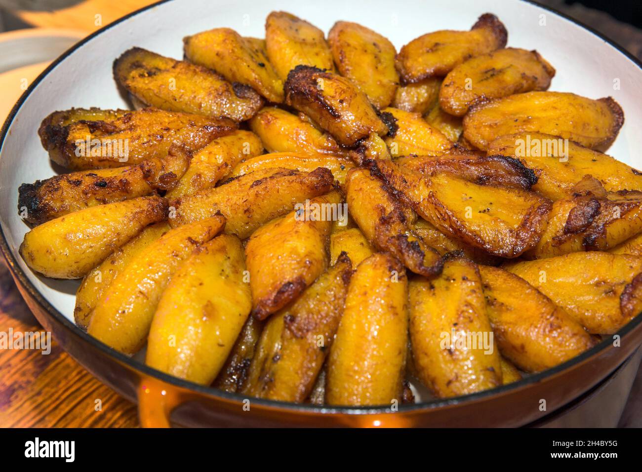 Fried plantains are served at a dinner buffet Stock Photo - Alamy