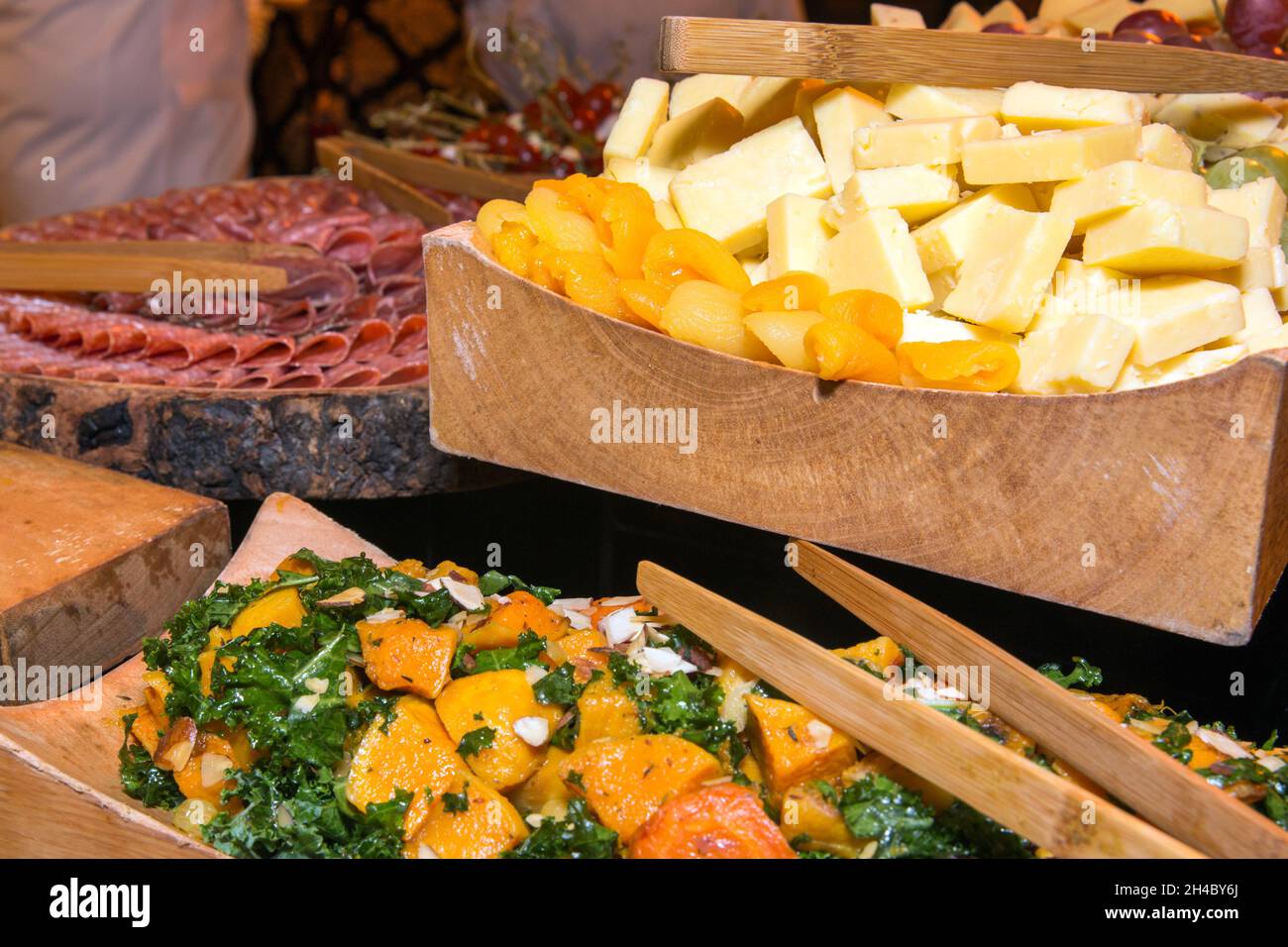 A cheese buffet is set up at an event Stock Photo - Alamy
